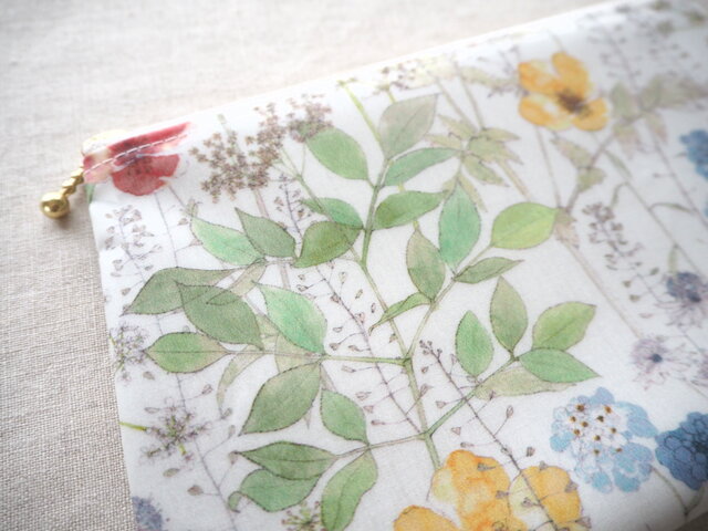 ラミネートラウンドポーチ 「Irma」 | iichi ハンドメイド・クラフト作品・手仕事品の通販