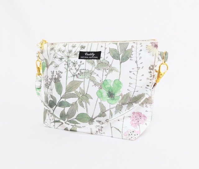 イルマグリーンの持ち手付き2Wayポーチ | iichi 日々の暮らしを心地よくするハンドメイドやアンティークのマーケットプレイス