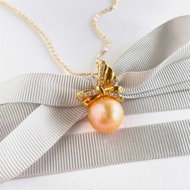 Outlet ピーチオレンジ 淡水パール リボンのペンダントネックレス (1.0cm) | iichi 日々の暮らしを心地よくするハンドメイドやアンティークのマーケットプレイス