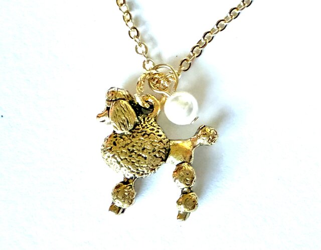 【アメリカ製 プードル（犬）のネックレス】アンティックゴールド | iichi 日々の暮らしを心地よくするハンドメイドやアンティークの ...