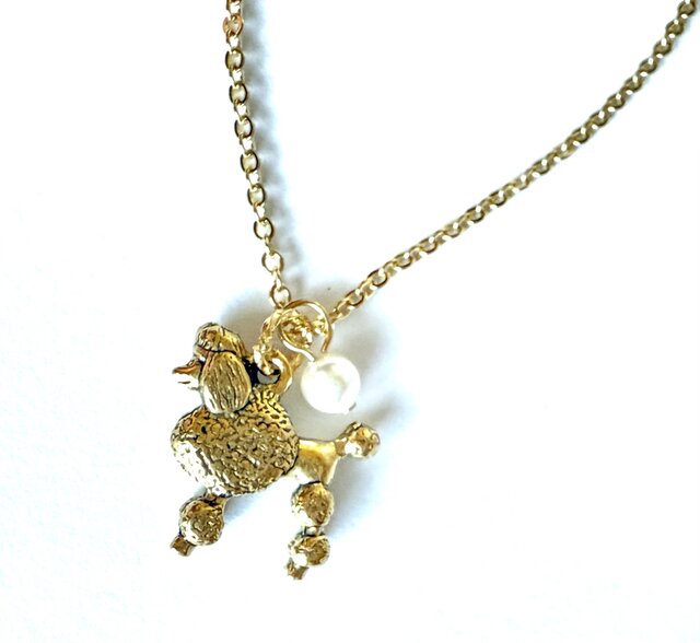 【アメリカ製 プードル（犬）のネックレス】アンティックゴールド | iichi 日々の暮らしを心地よくするハンドメイドやアンティークの ...