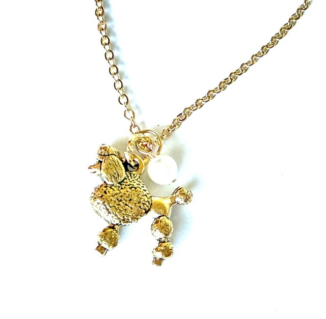 【アメリカ製 プードル（犬）のネックレス】アンティックゴールド | iichi 日々の暮らしを心地よくするハンドメイドやアンティークの ...